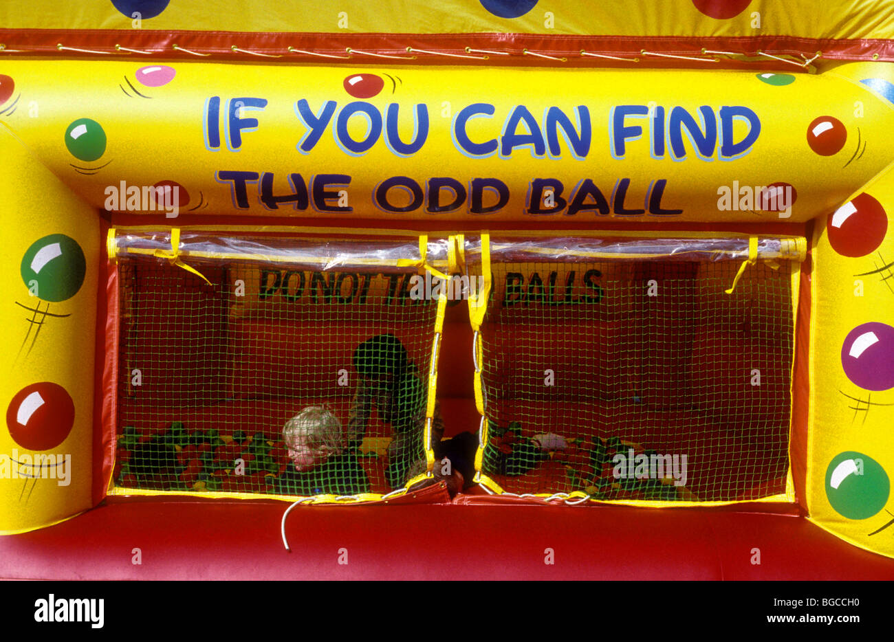 Children in an inflatable bouncy fun fair castle Stock Photo - Alamy