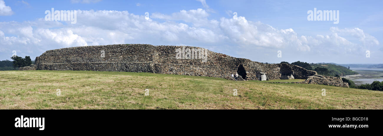 Tourists visiting the Cairn of Barnenez / Barnenez Tumulus / Mound, a ...