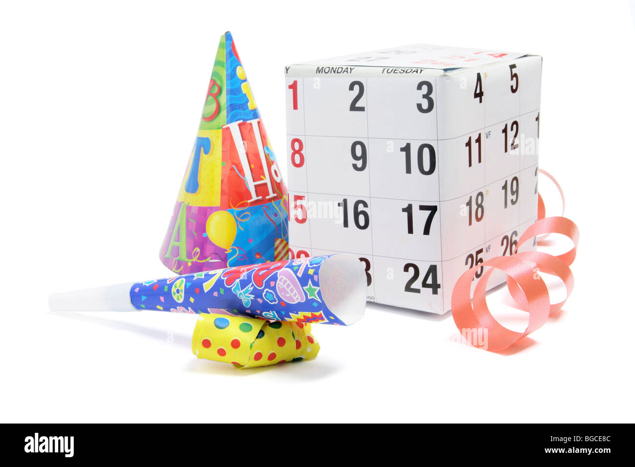 Gift Parcel Wrapped with Calendar Page and Party Favors Stock Photo - Alamy