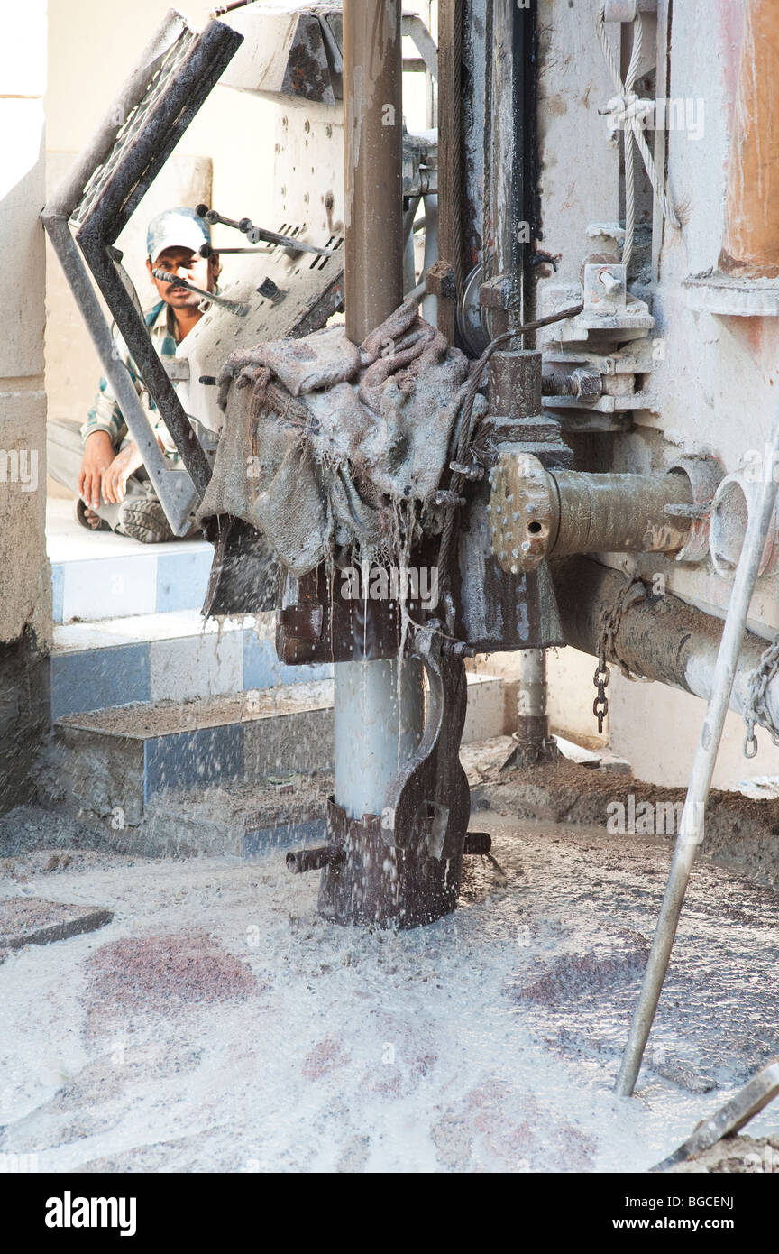 Drilling a bore well for water in the Indian town of Puttaparthi ...