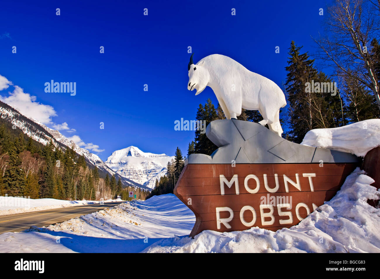 A mountain goat statue atop a sign for Mount Robson Provincial Park ...