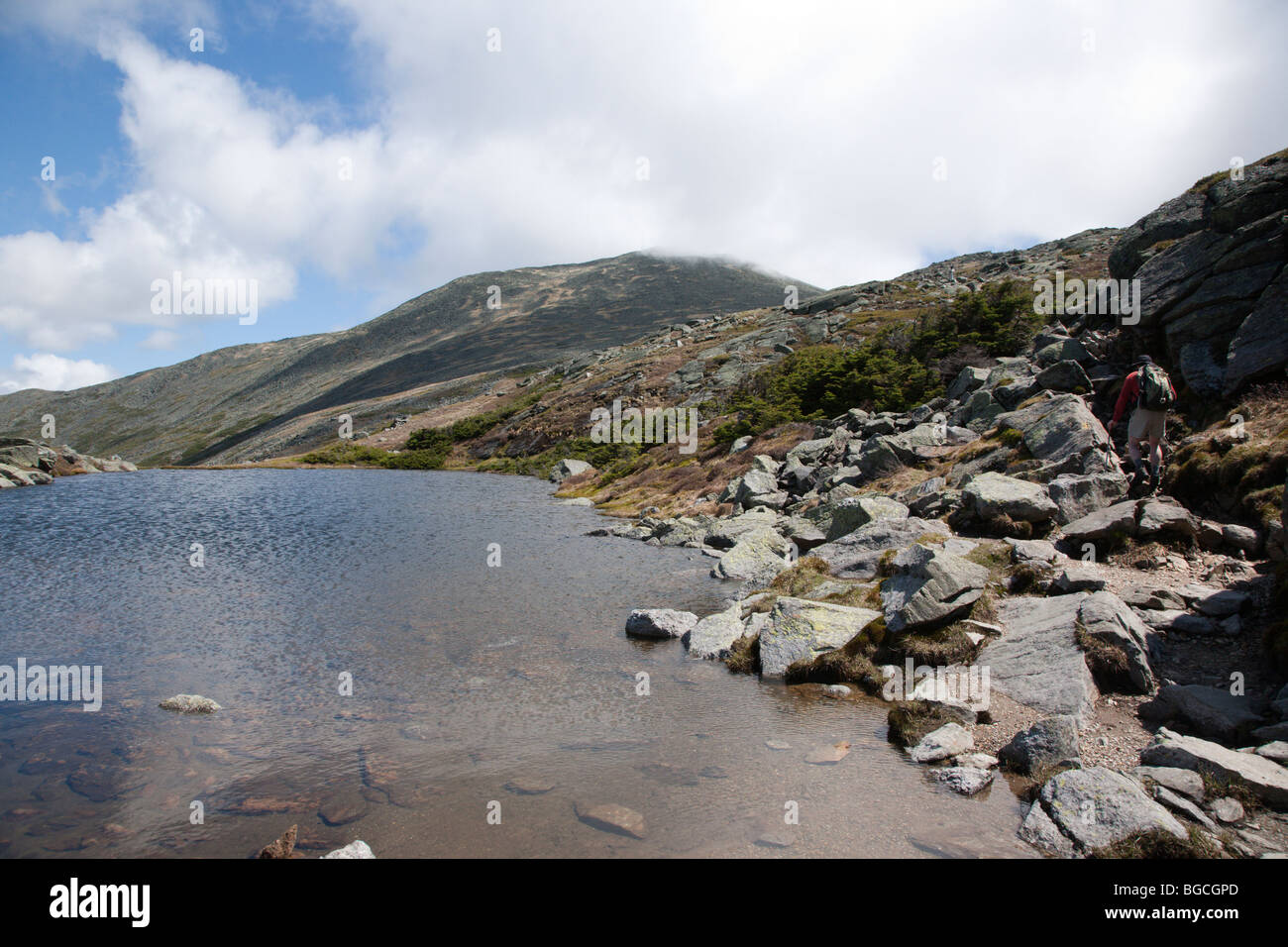 Appalachian Trail...A hiker passes Lakes of the Clouds, which is ...