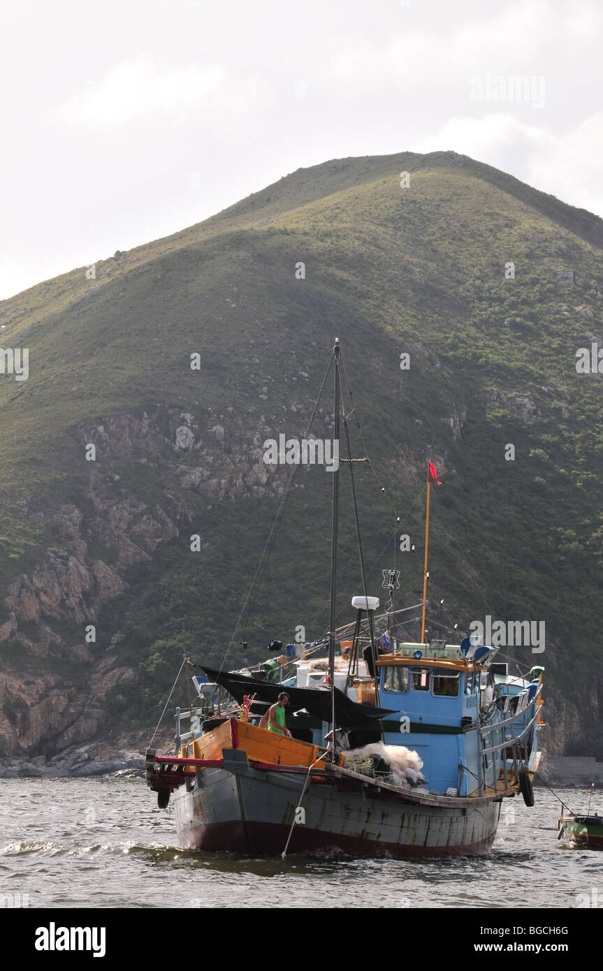 Front view of a fishing junk, anchored in the China sea, near the ...