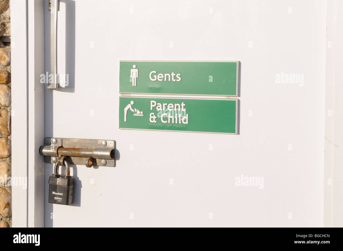 Signs on locked toilet door Stock Photo - Alamy