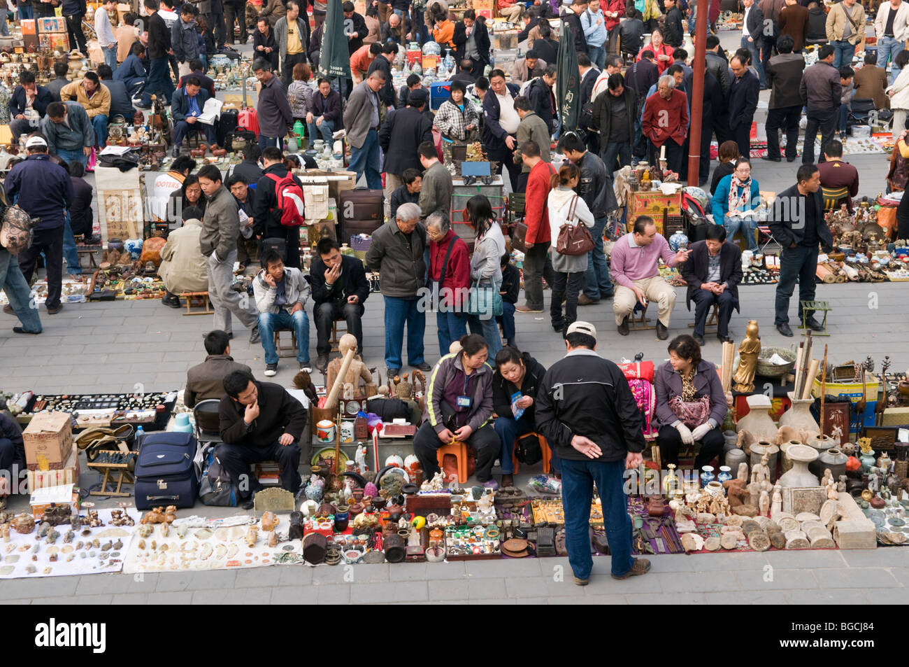 Vendors selling their goods on the ground at the Dirt Market also named ...