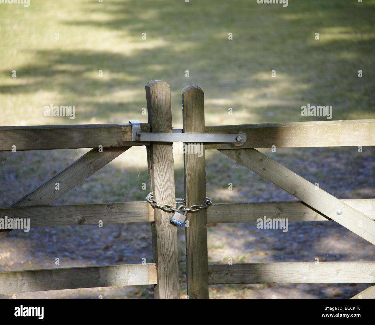 a locked gate with a chain Stock Photo - Alamy
