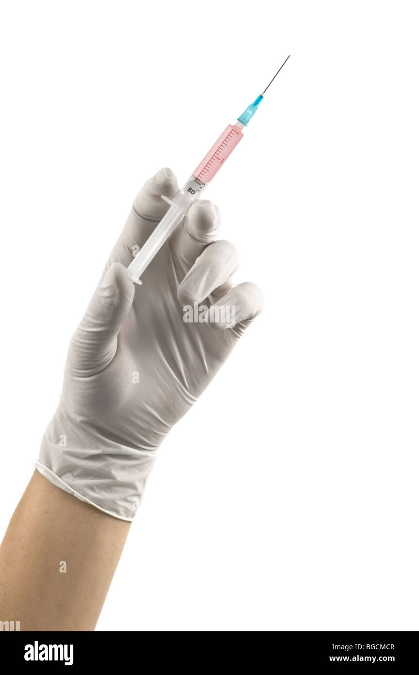 syringe in hand isolated Stock Photo - Alamy