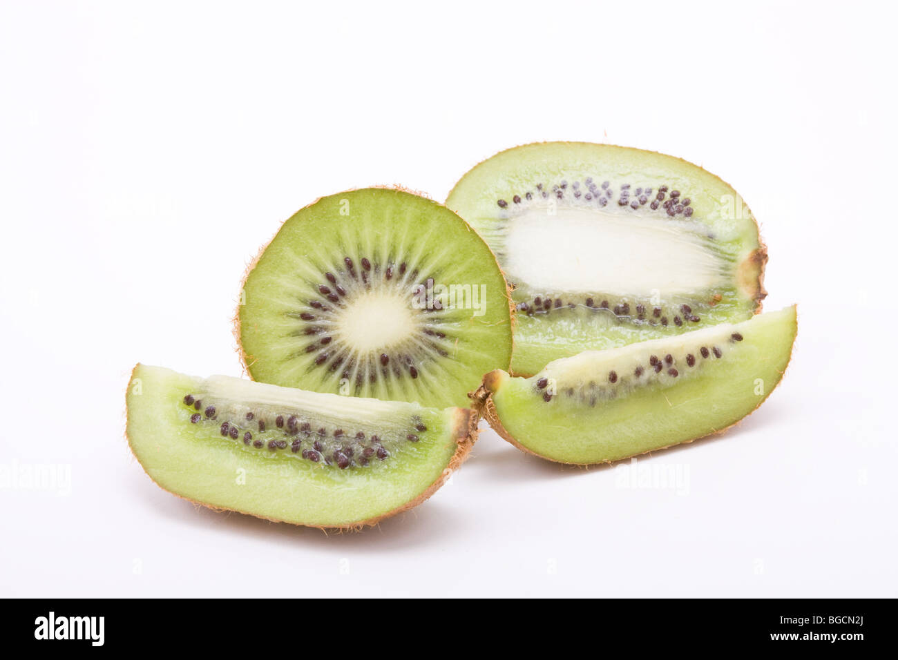 Fresh ripe Kiwi Fruit Segments isolated against white background Stock ...