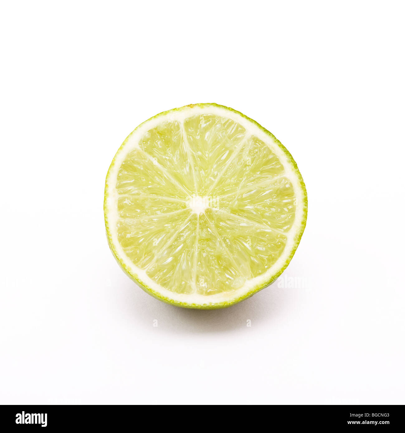 natural Green Lime isolated against plain white background Stock Photo ...
