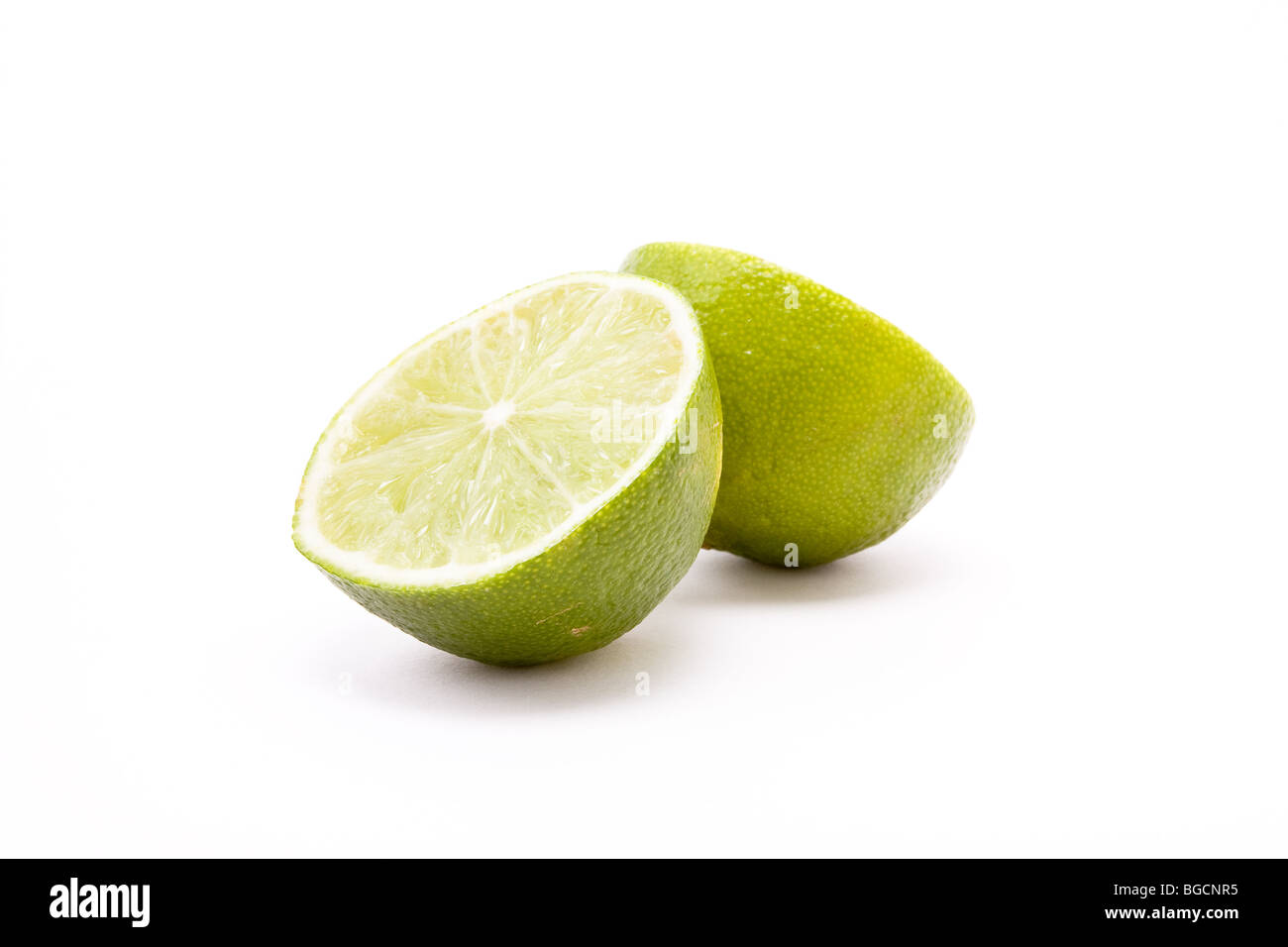 natural Green Lime isolated against plain white background Stock Photo ...