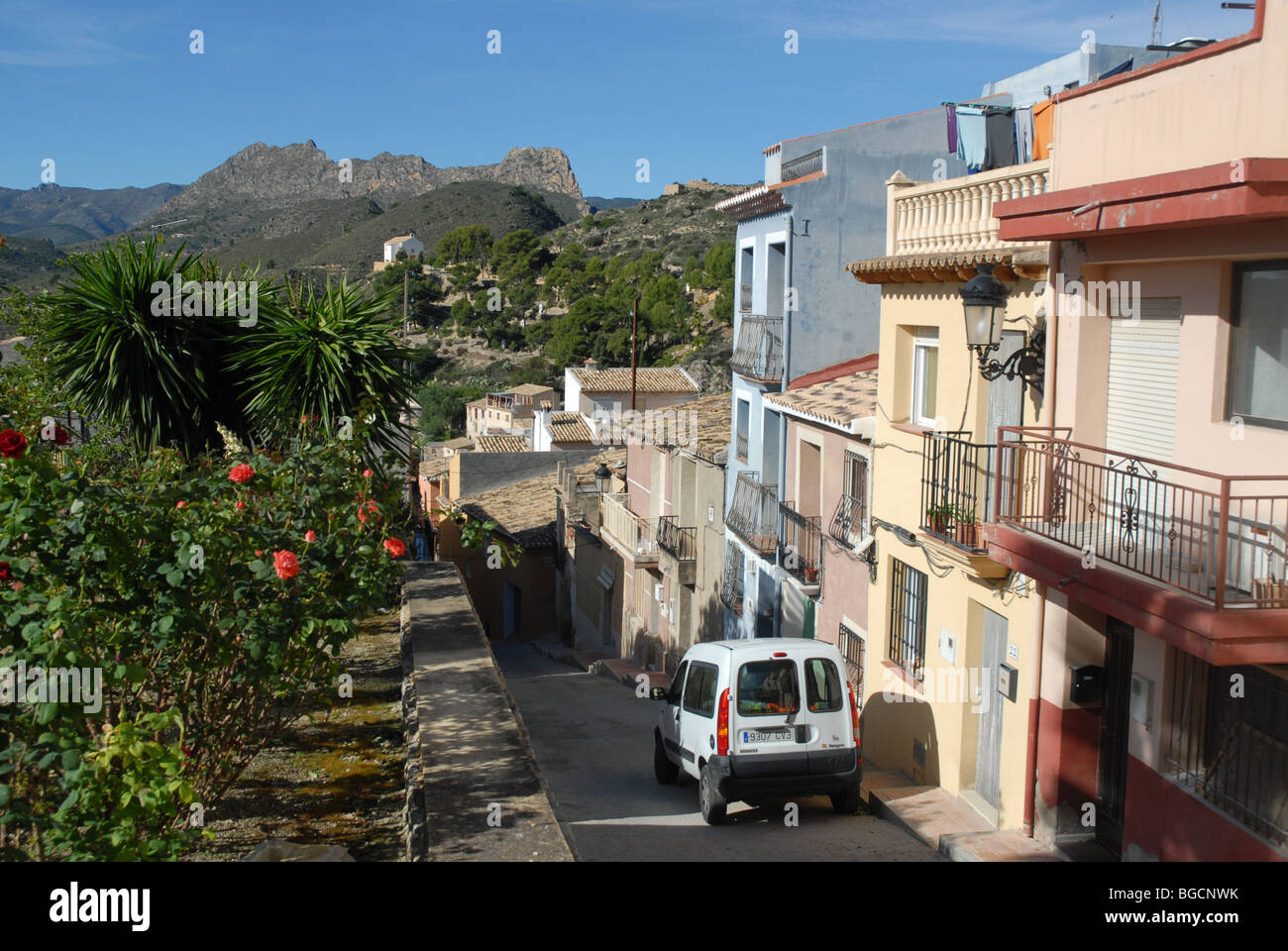 van parked in narrow, steep street in village of Relleu, Alicante ...