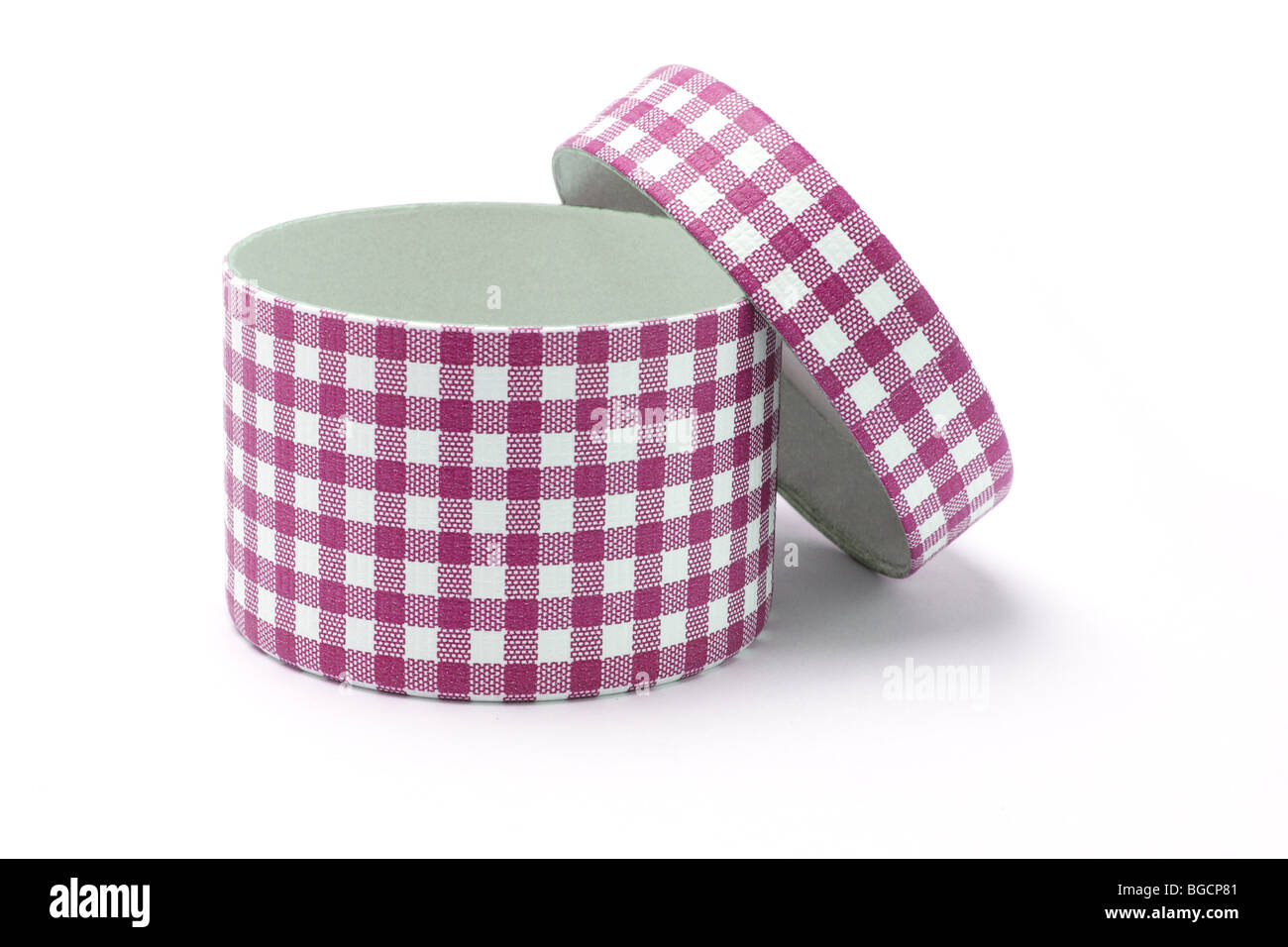 Open red chequer gift box on white background Stock Photo - Alamy