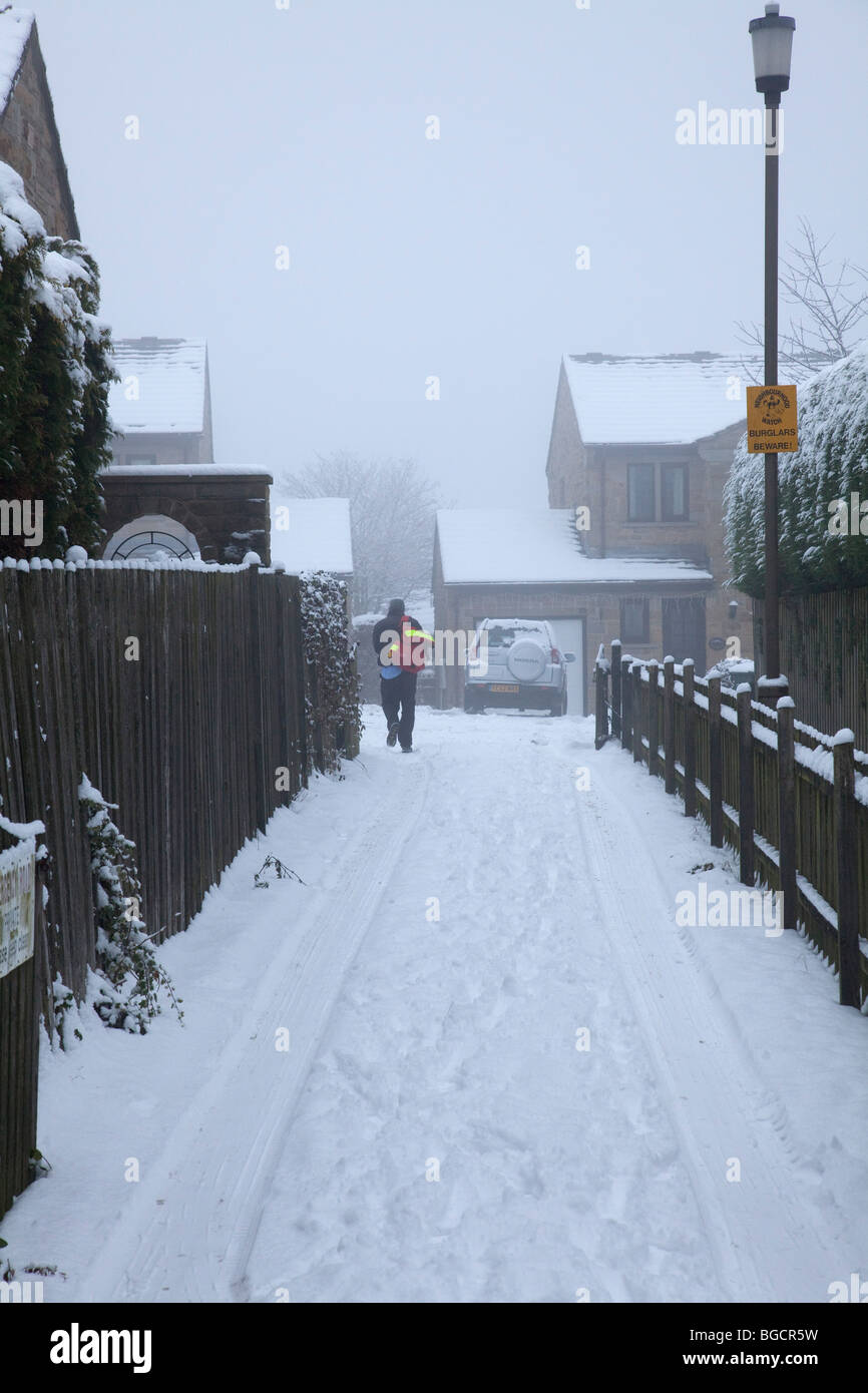 Postman walking down path hi-res stock photography and images - Alamy