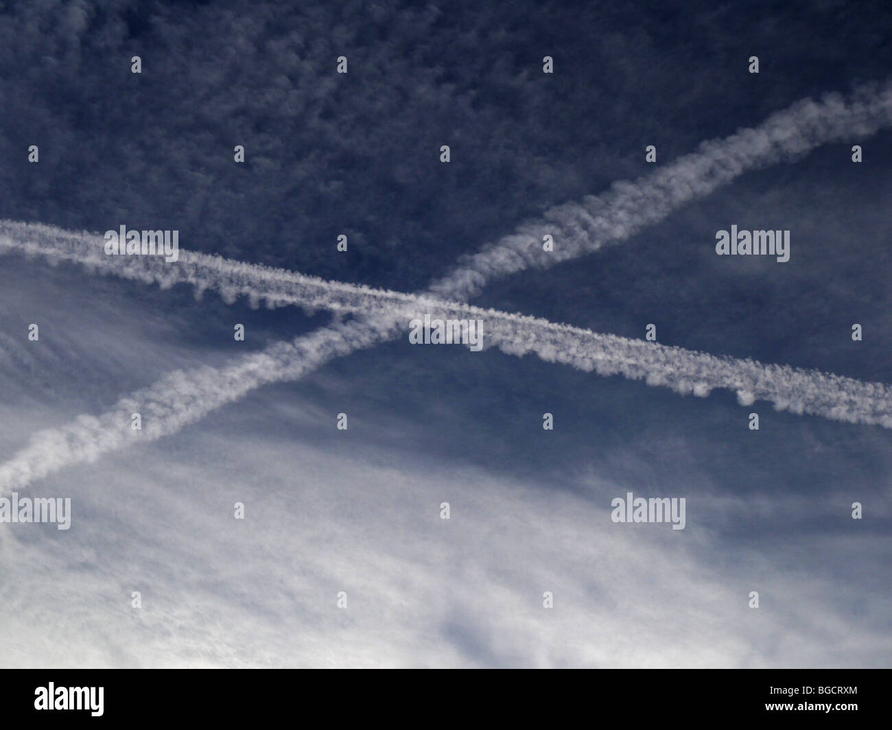 Crossed Contrails & Cirrus Cloud Stock Photo - Alamy