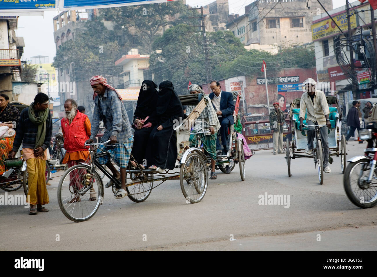 Two muslim women wearing burkhas on a rickshaw in Varanasi, India Stock ...