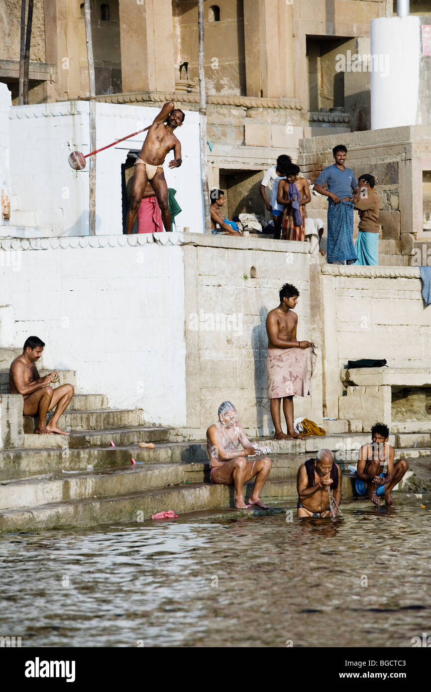 Men bathing in holy River Ganges in Varanasi, India Stock Photo - Alamy