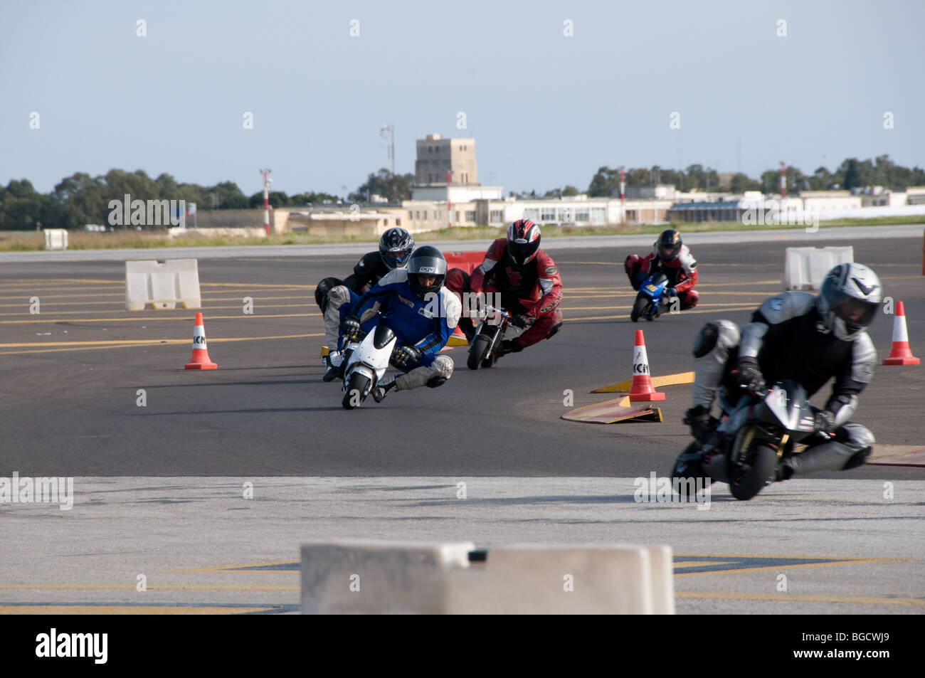 Mini Motor bikes race around a temporary circuit built on Luqa Airport ...