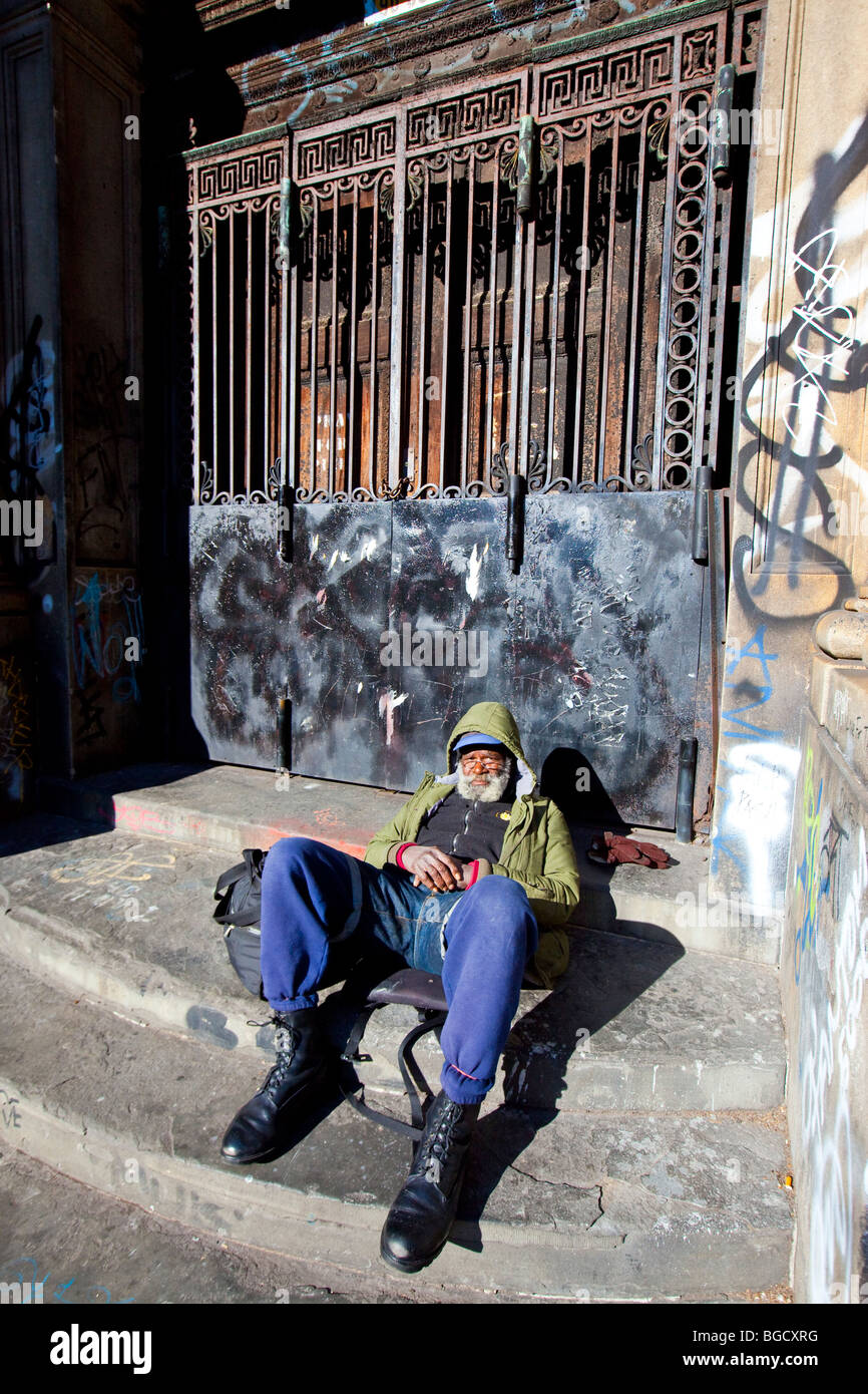 Homeless man in front of 190 Bowery Germania Bank Building, Lower East ...