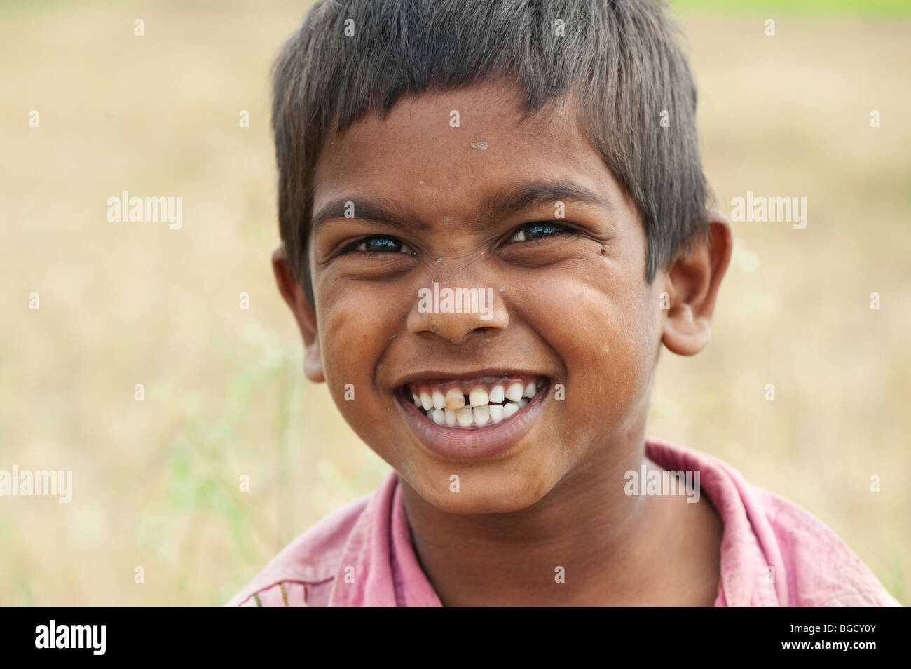 Happy Indian boy smiling Stock Photo - Alamy