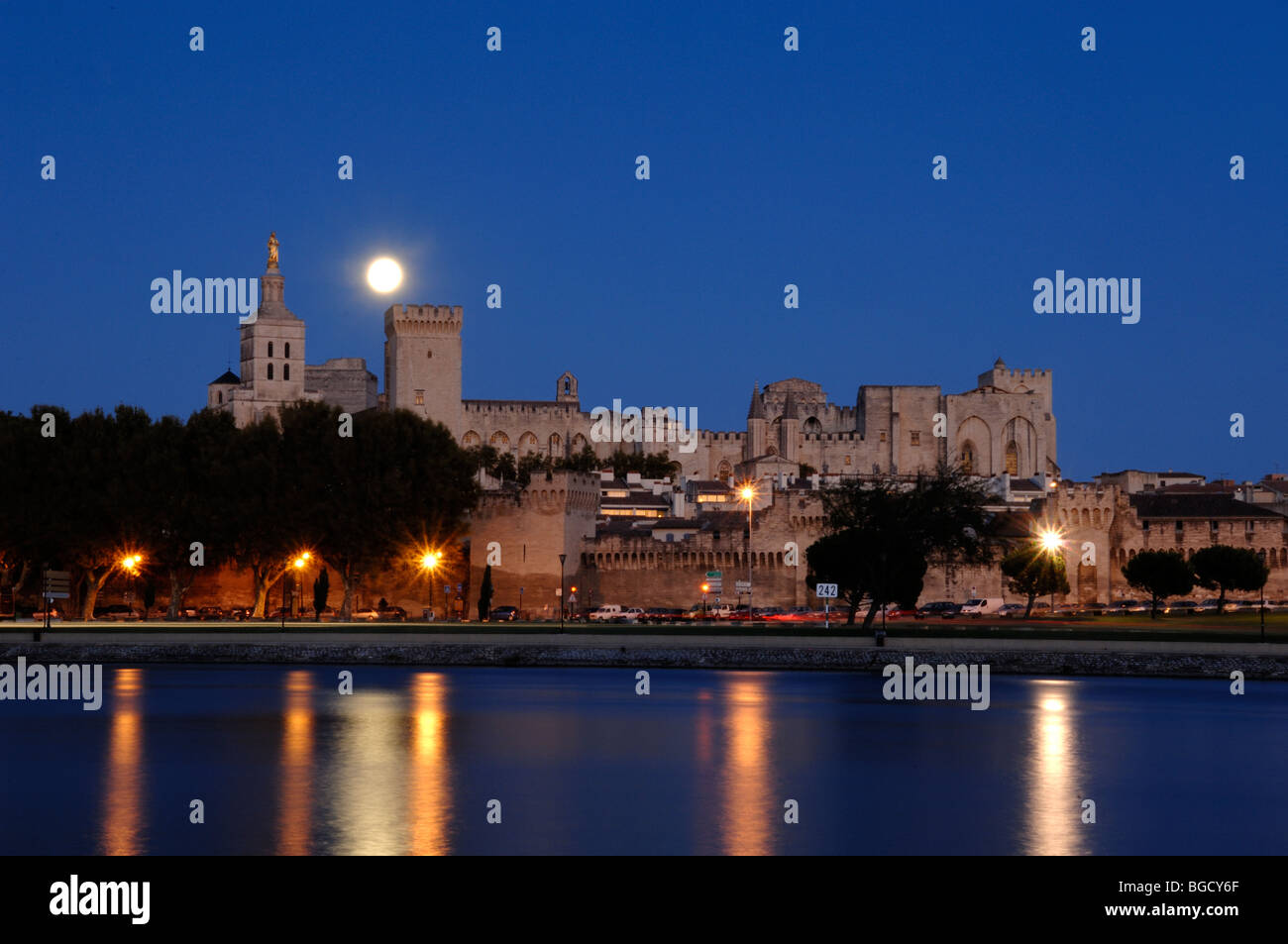 Full Moon Rising over the Palais des Papes or Popes Palace with Lights ...
