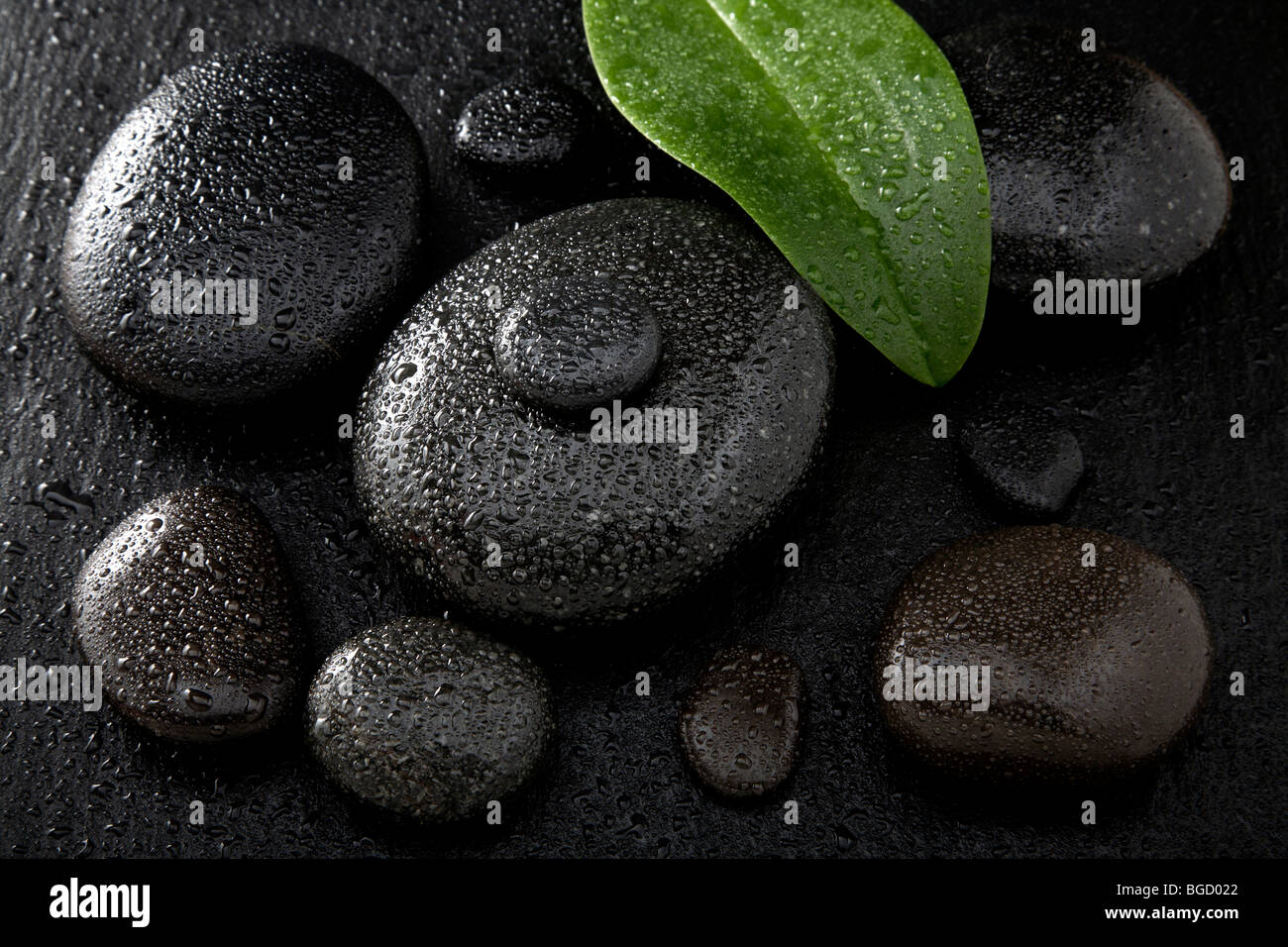 Hot stones, basalt massage stones Stock Photo - Alamy