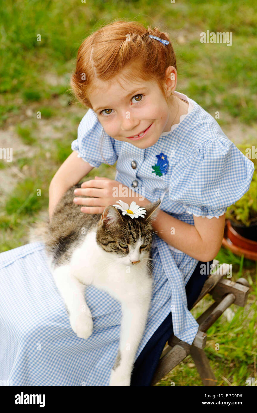 Girl with cat Stock Photo - Alamy