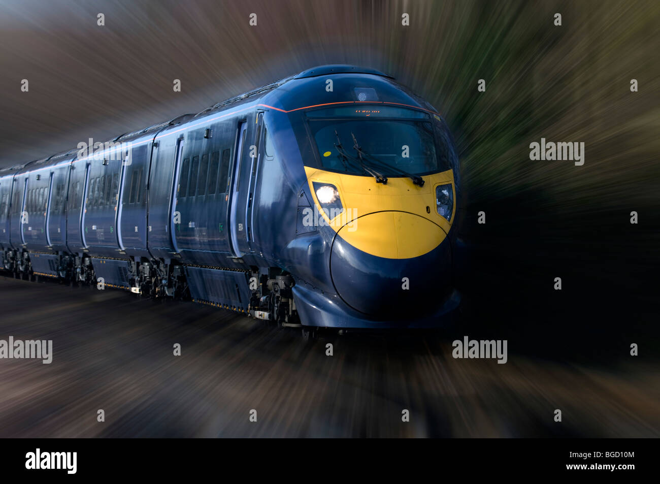 Highspeed train rush through the countryside Stock Photo - Alamy