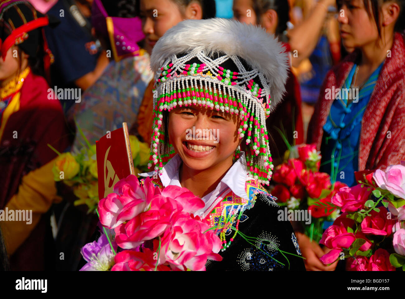 Festival, young Hmong woman, portrait, dressed in traditional clothing ...