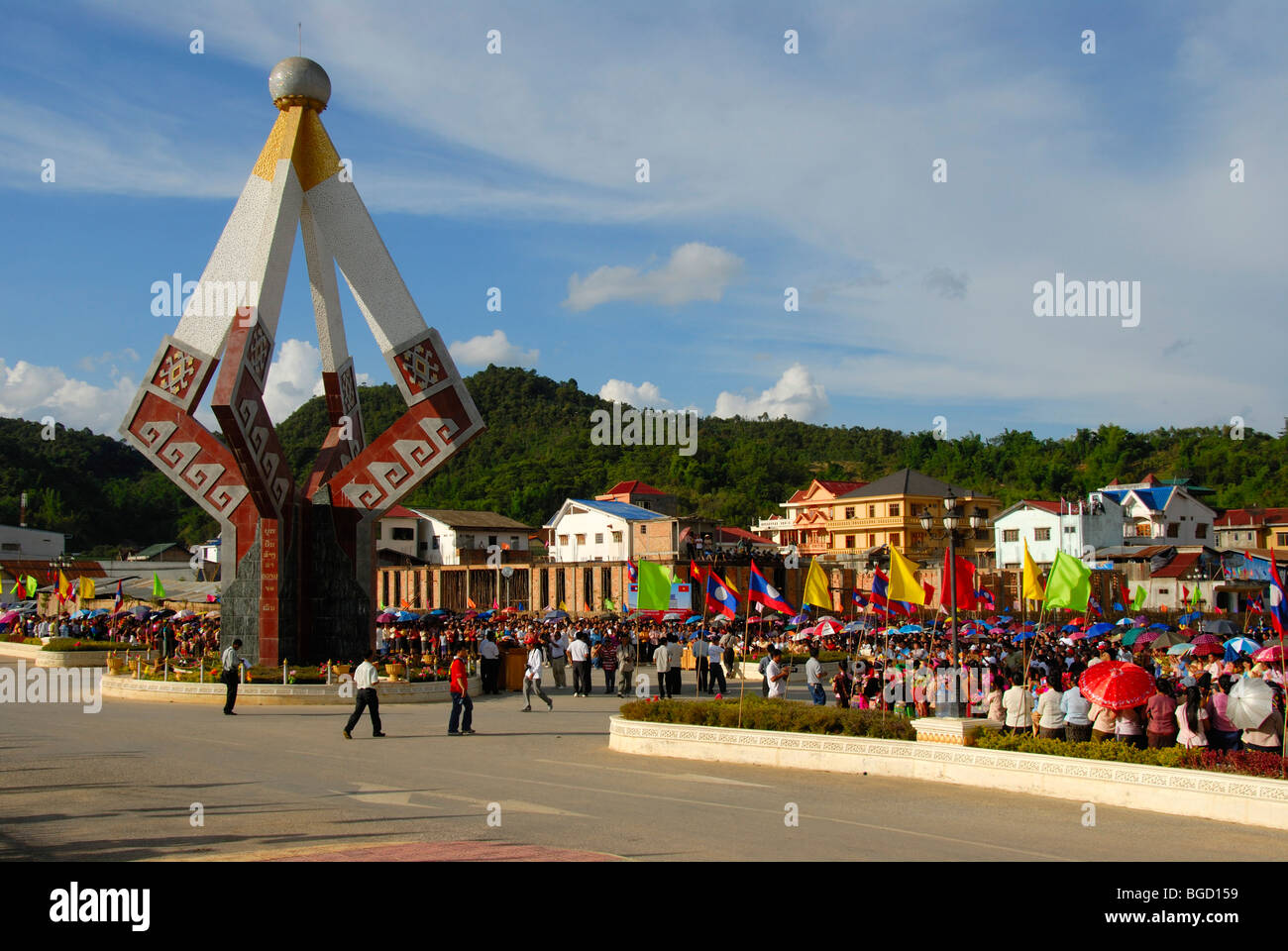 Festival, crowd around a monument, Xam Neua, Houaphan province, Laos ...