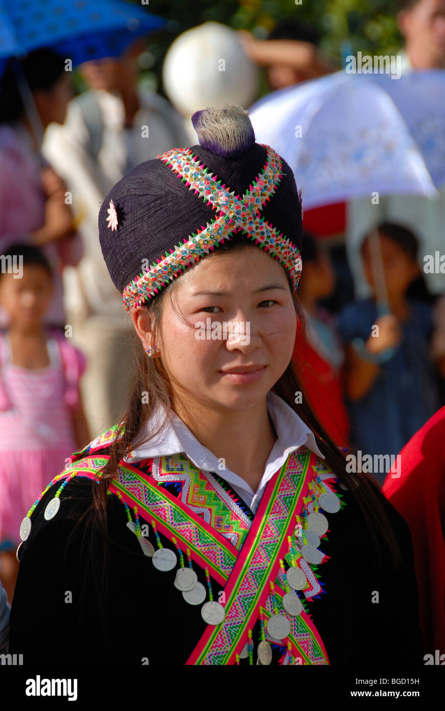Festival, young Hmong woman, portrait, dressed in traditional clothing ...