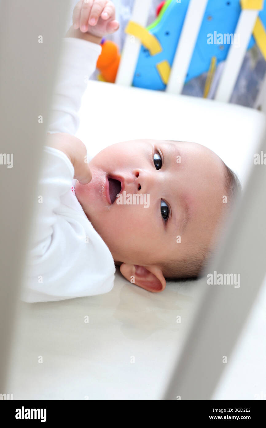 Selective focus of baby inside cradle Stock Photo - Alamy