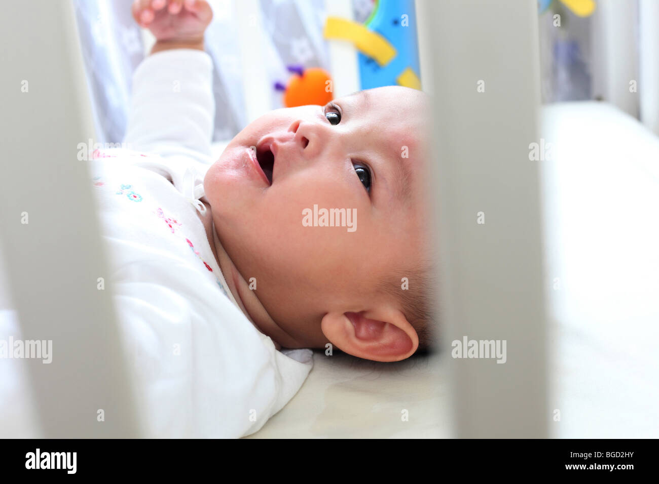 Baby inside cradle Stock Photo - Alamy