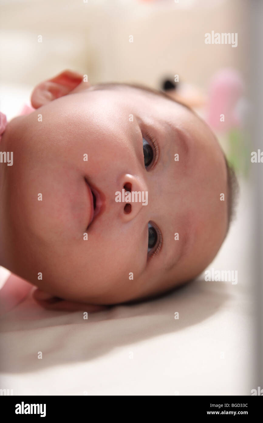 Close up of head of baby girl Stock Photo - Alamy
