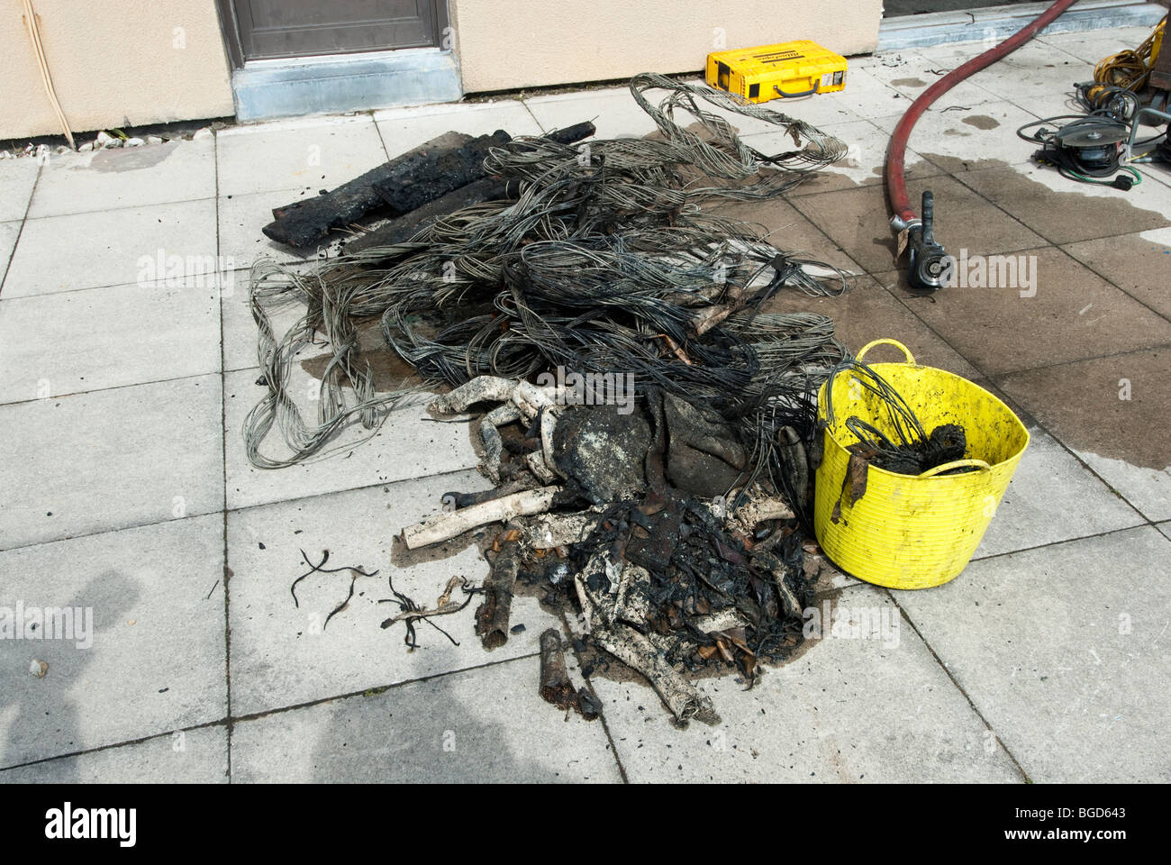 Burnt cable from electrical fire showing steel wire armour Stock Photo ...