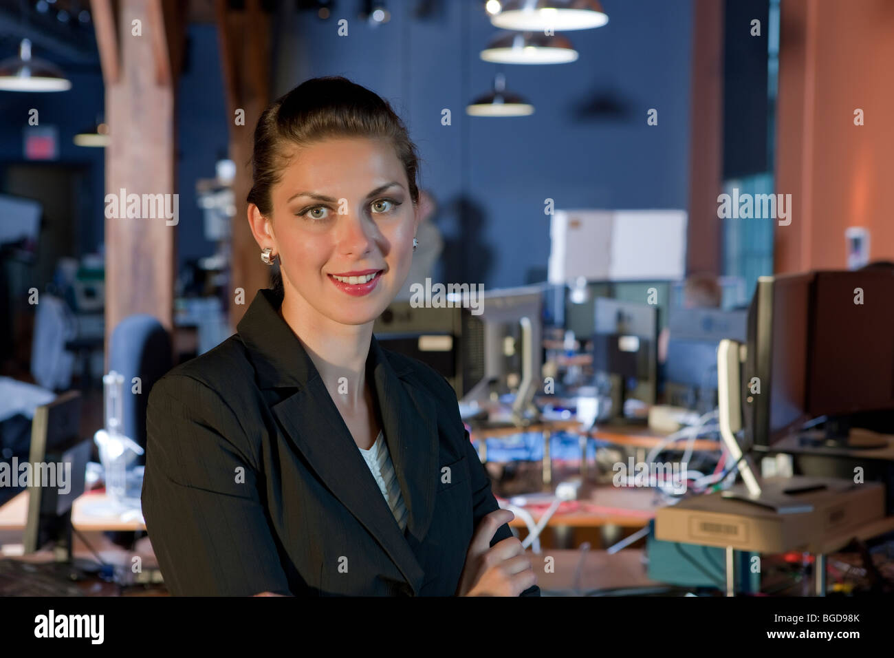A female office worker in an office environment Stock Photo - Alamy