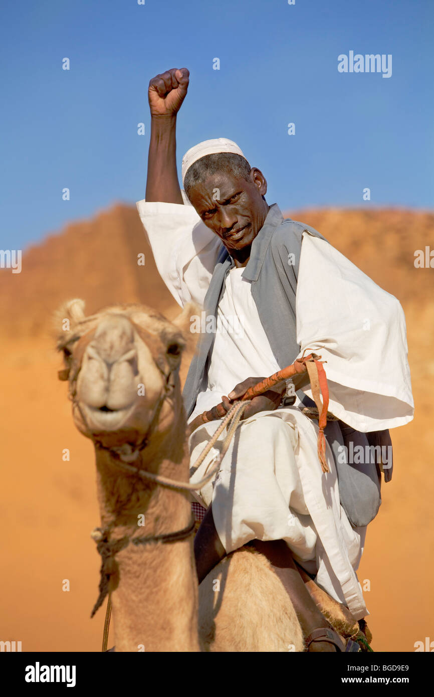 Camel rider in front of the Nubian pharaohs and kings necropolis in ...