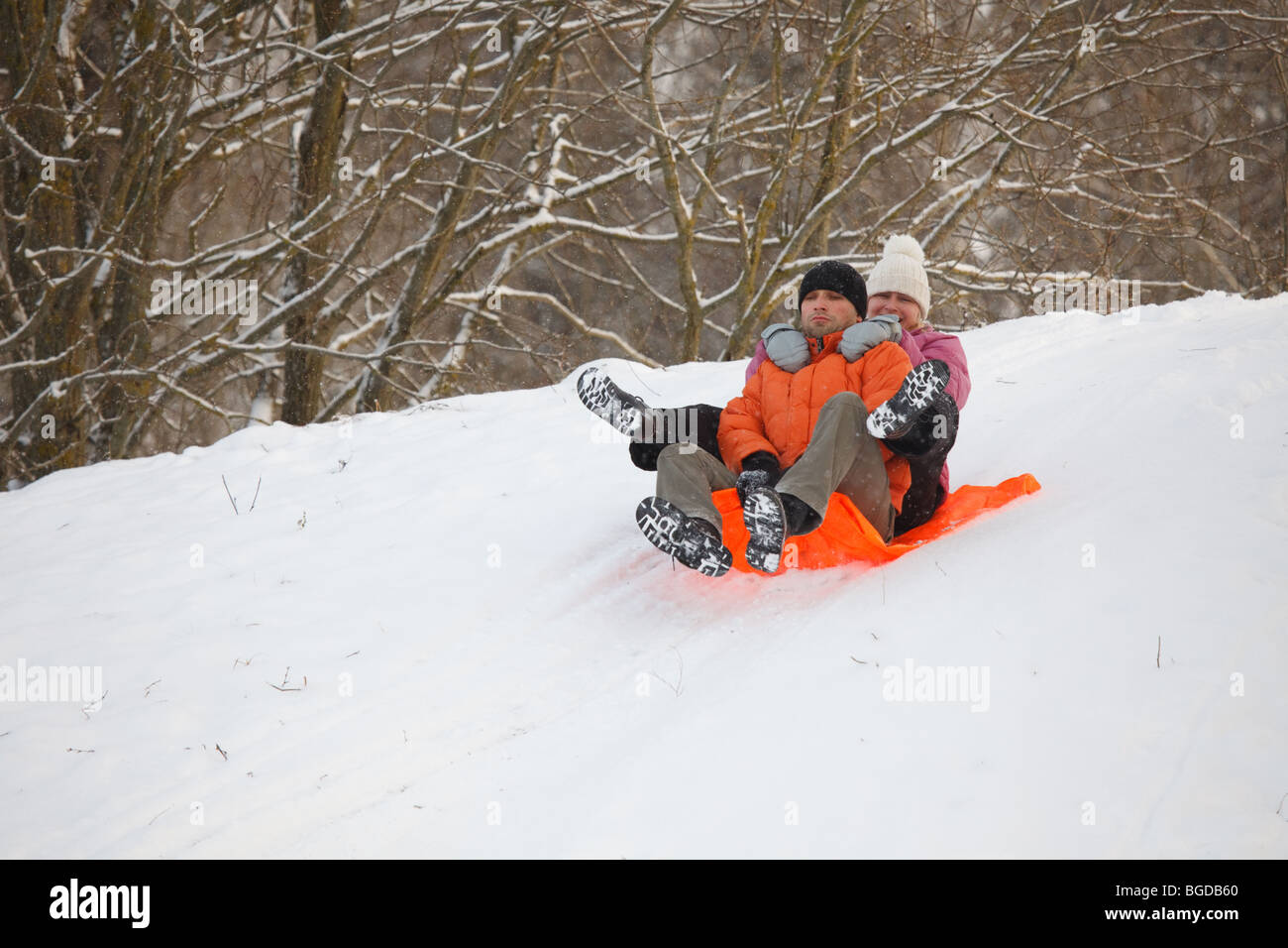 Family in winter scene having fun hi-res stock photography and images ...