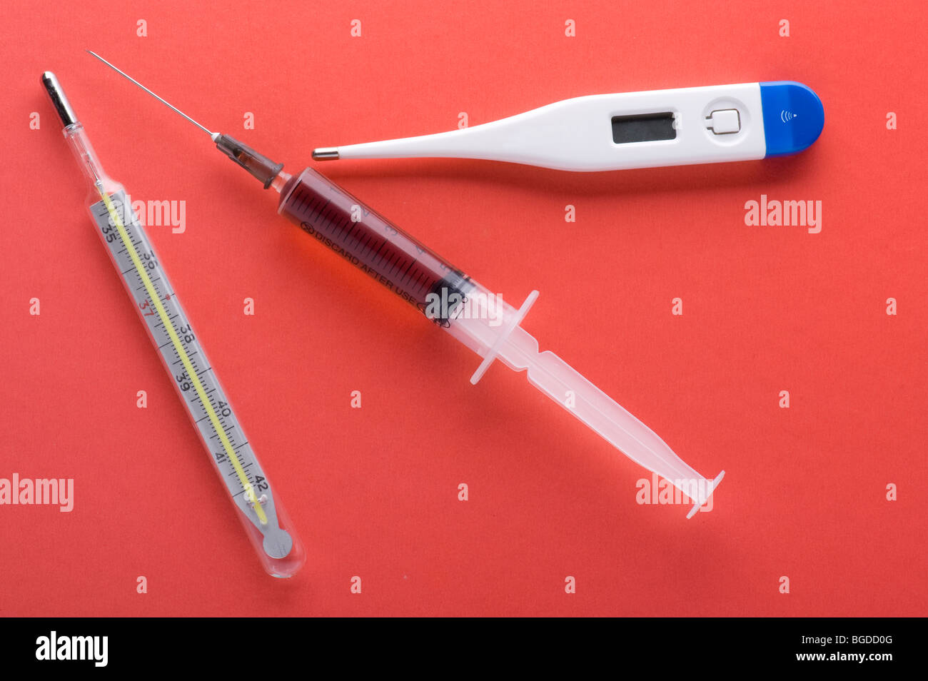 object on red - medical thermometer close up Stock Photo - Alamy