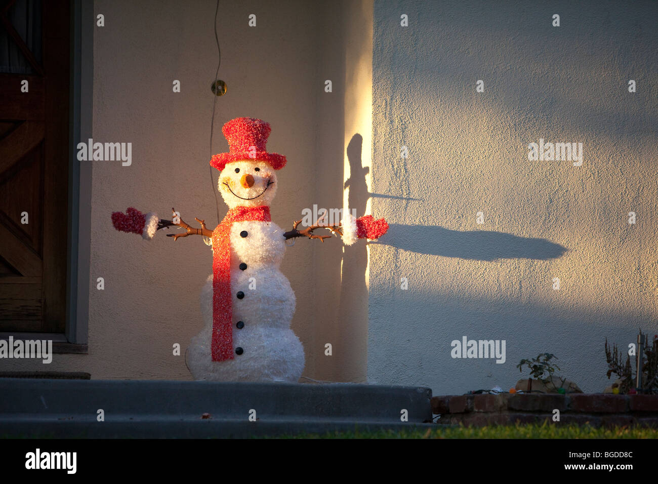 Snowman Christmas decoration with low angle lighting and interesting ...