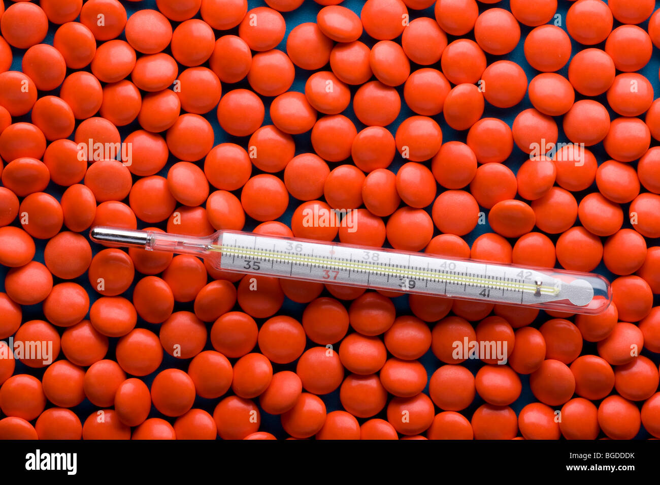 object on blue - medical Tablet and thermometer Stock Photo - Alamy