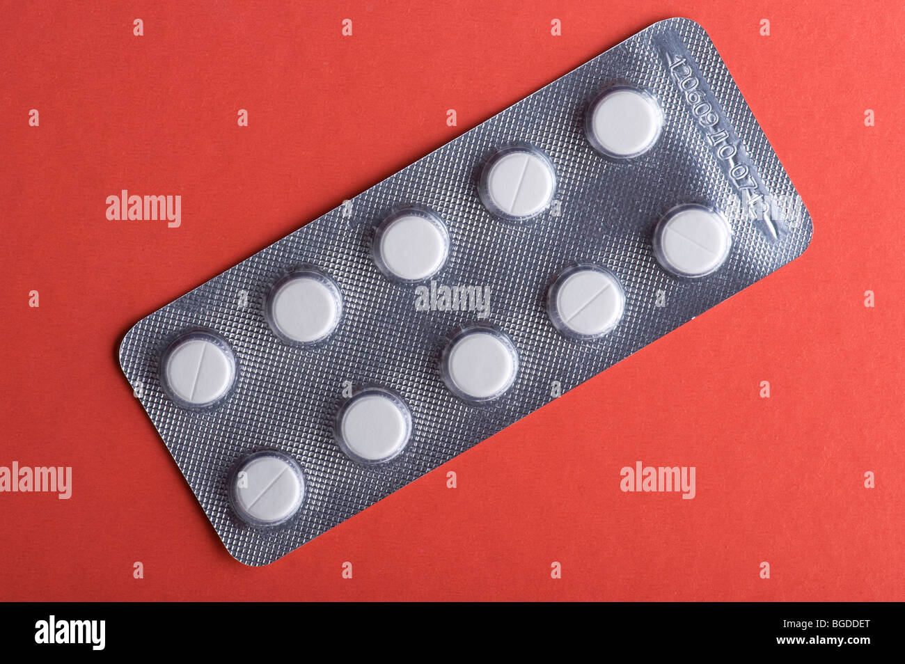 object on red - medical Tablet close up Stock Photo - Alamy
