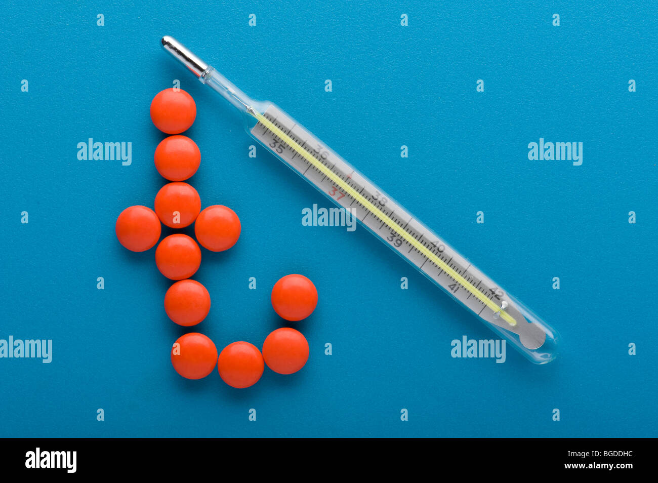 object on blue - medical Tablet and thermometer Stock Photo - Alamy