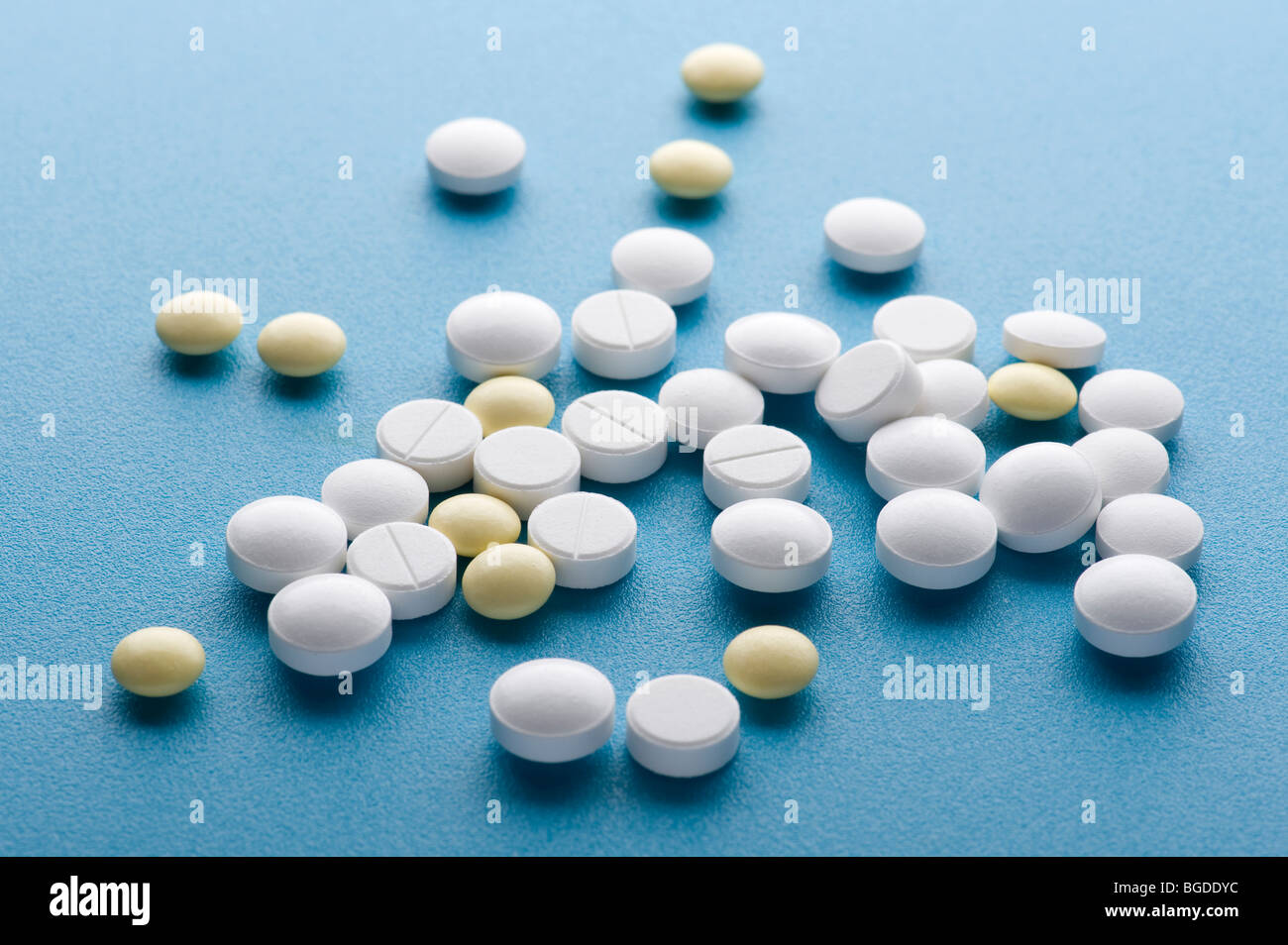 object on blue - Medical tablet close up Stock Photo - Alamy