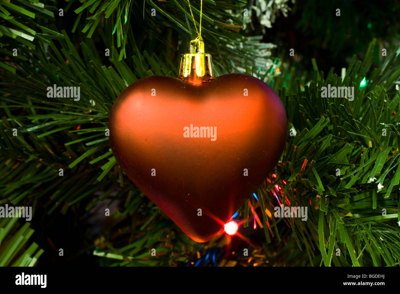 Heart shaped decoration on Christmas Tree Stock Photo - Alamy