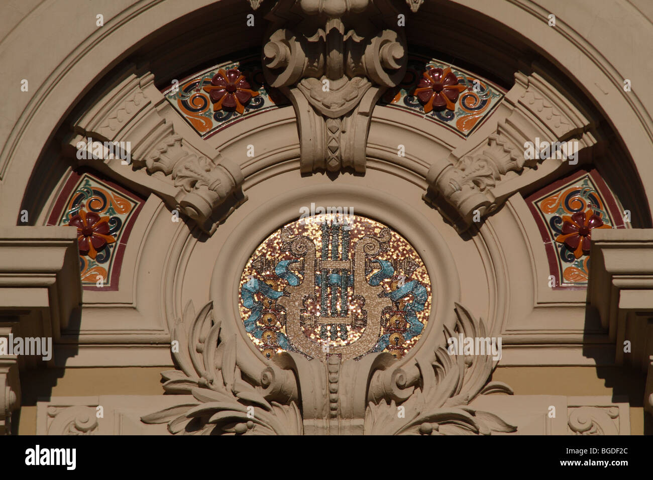 Ornamentation with a mosaic above the entrance of the west facade of ...