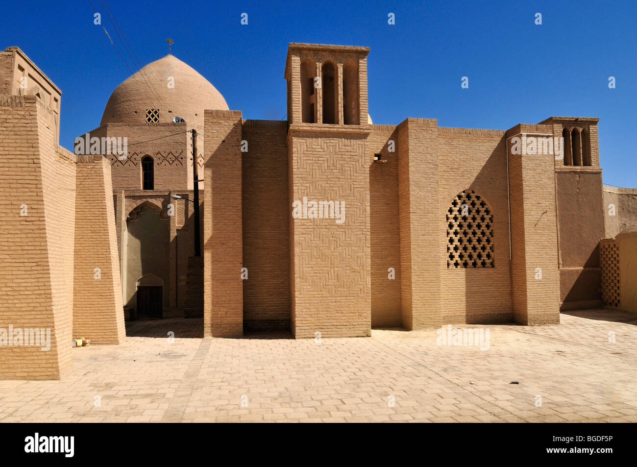 Windtower in the historic mosque complex, historic adobe town of Nain ...