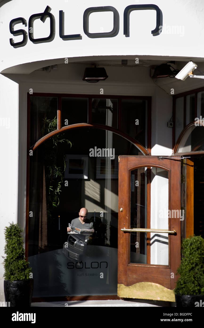 One man sitting in cafe hi-res stock photography and images - Alamy