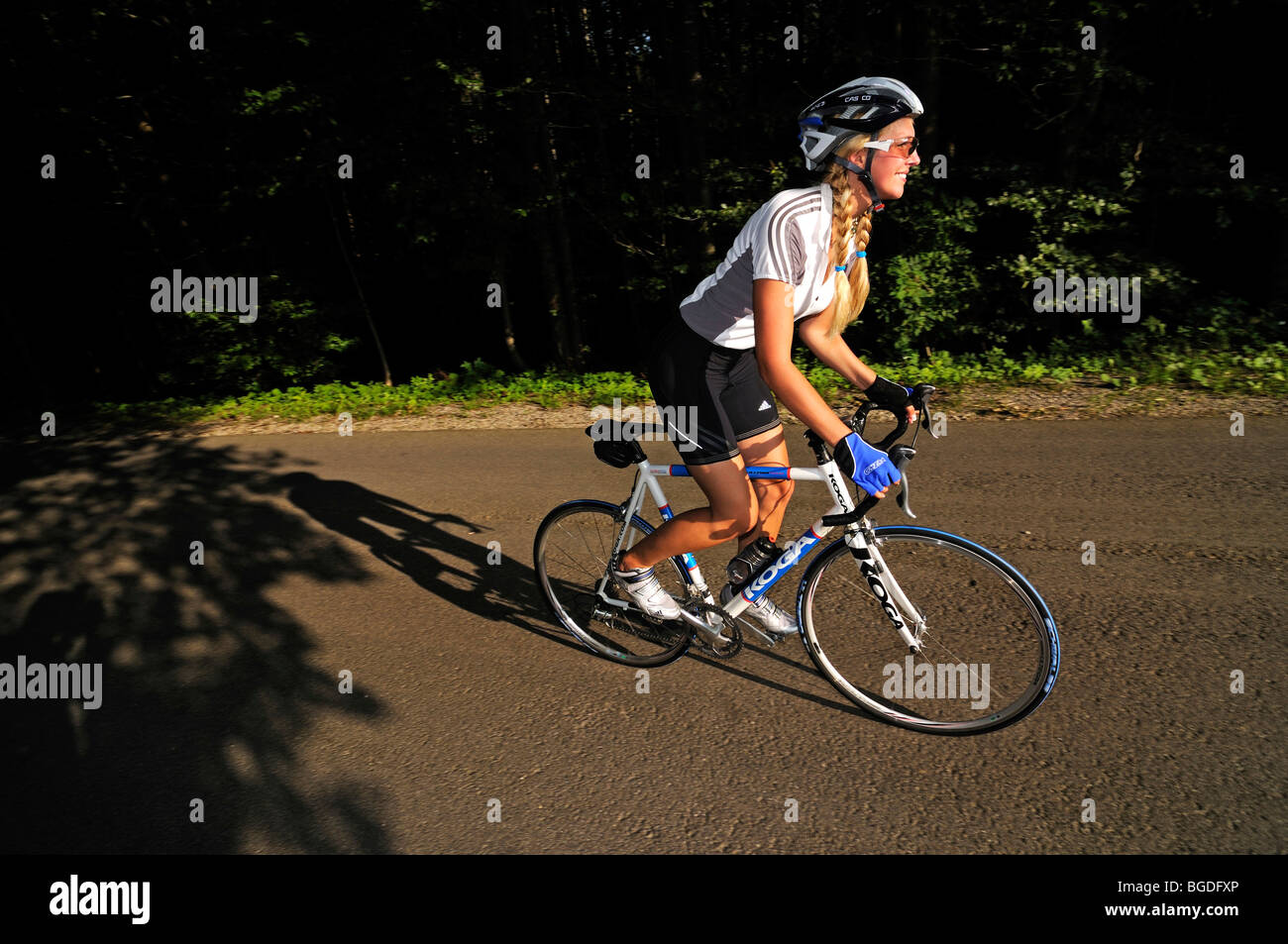 Young woman riding a bicycle, Bavaria, Germany, Europe Stock Photo - Alamy