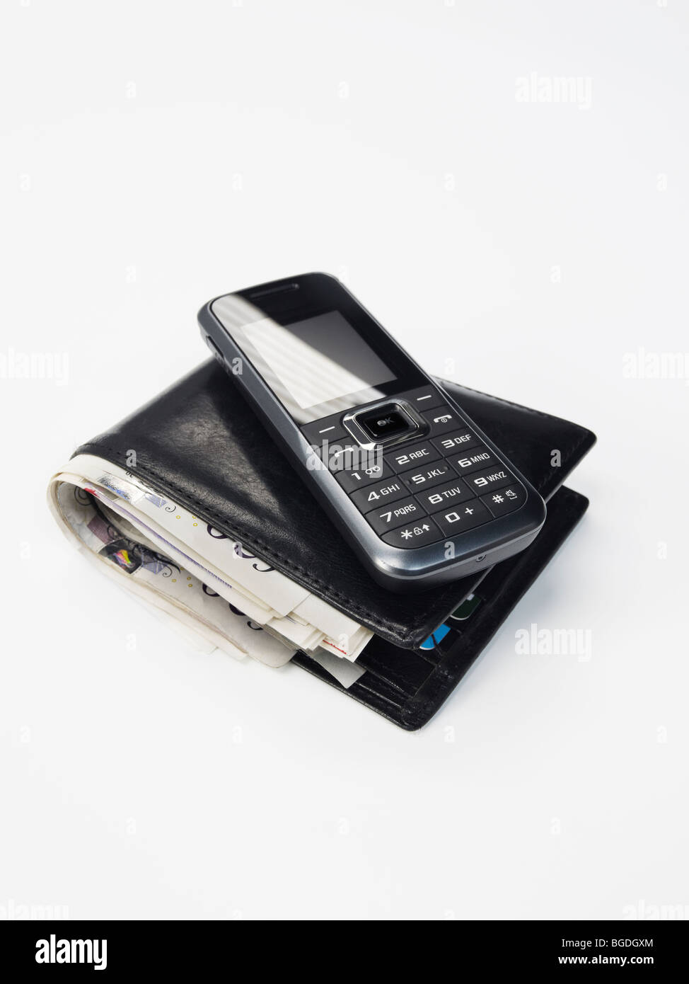 a mobile phone on a wallet Stock Photo - Alamy