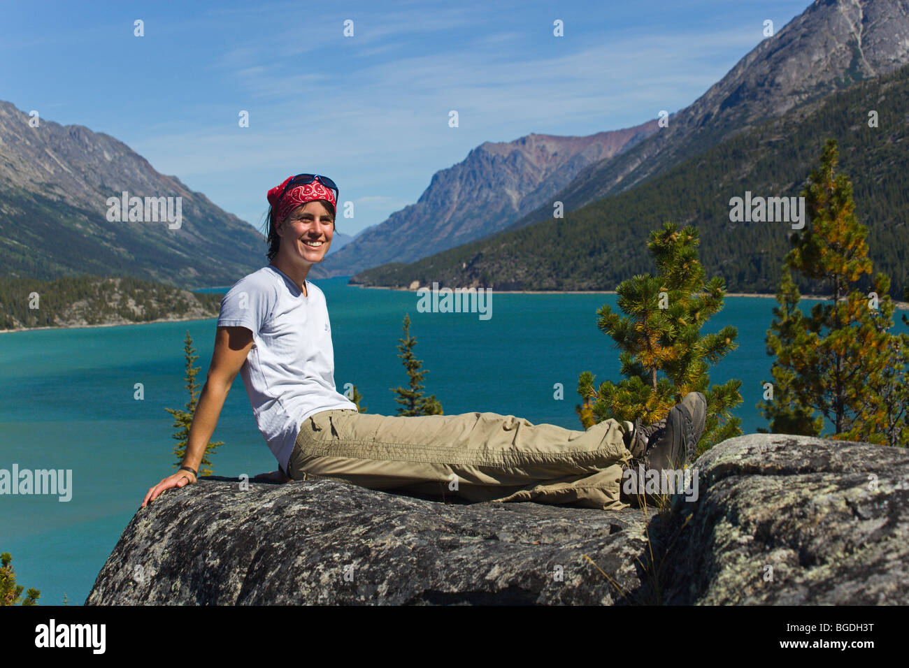 People resting on rock hi-res stock photography and images - Alamy